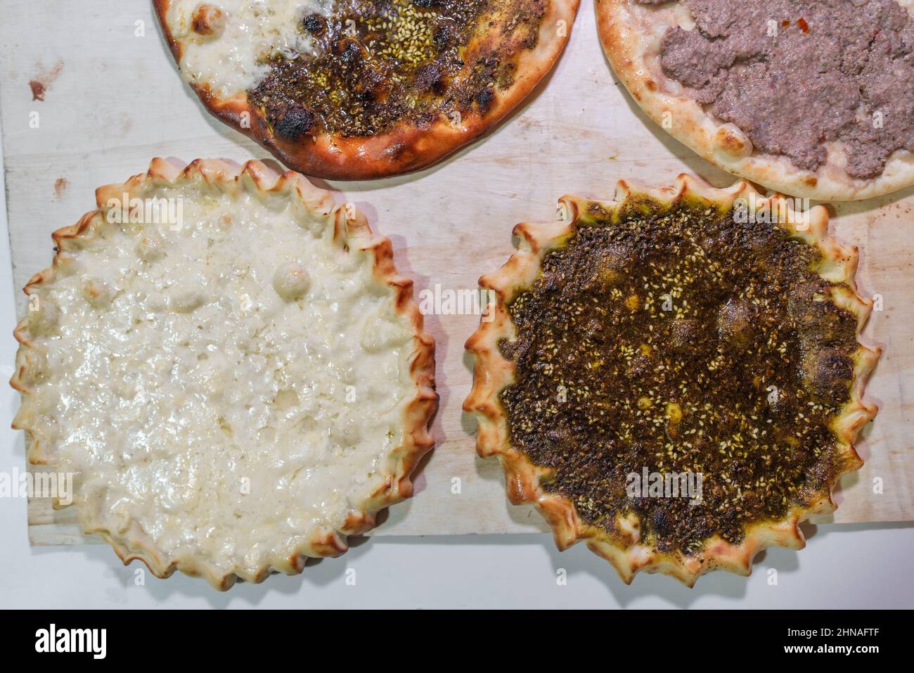 Lebanese Middle Eastern Manakish, Freshly baked Flatbread of cheese ...
