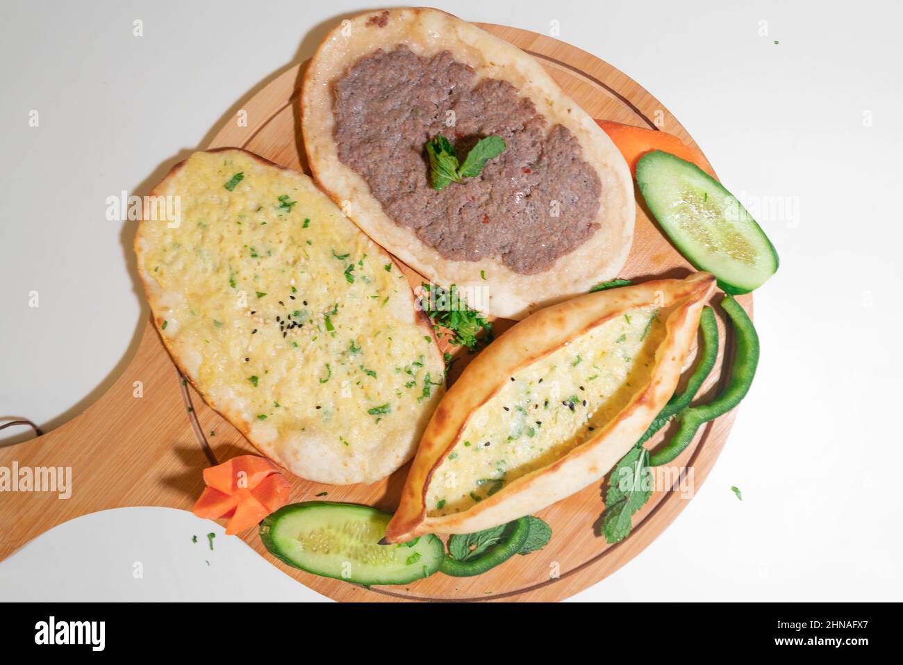 Lebanese Middle Eastern Manakish, Freshly baked Flatbread of cheese ...