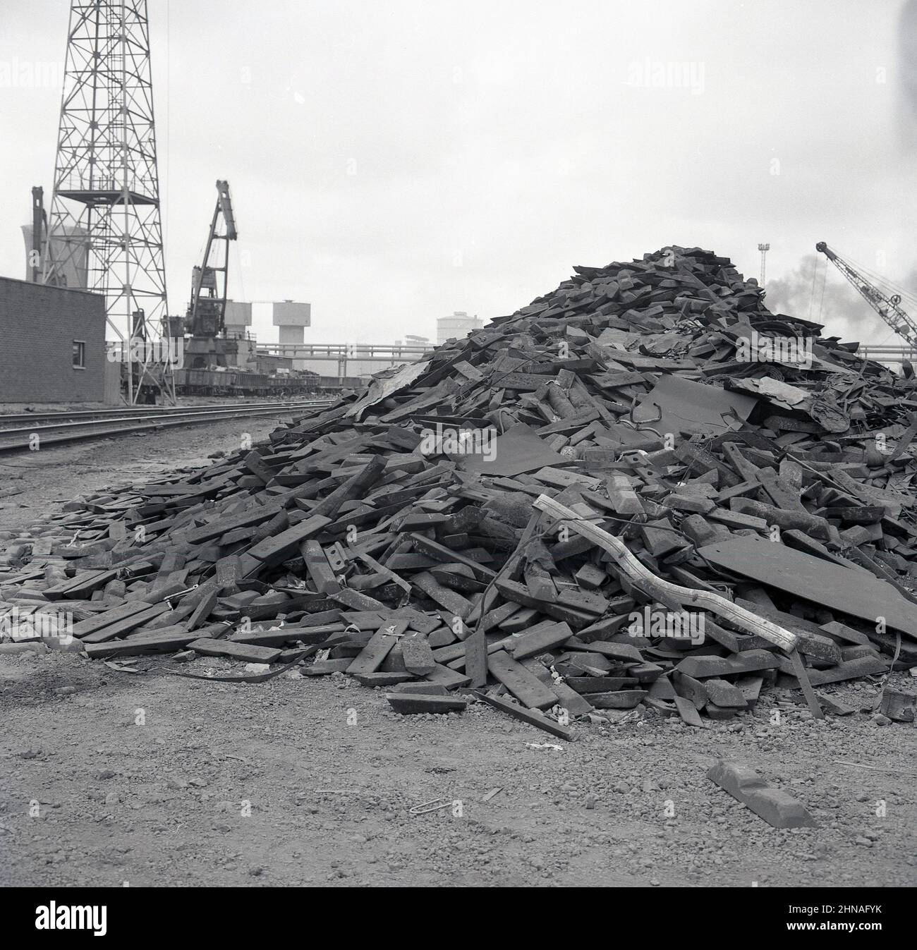 1950s, historical, a large pile of discarded waste from metal ...
