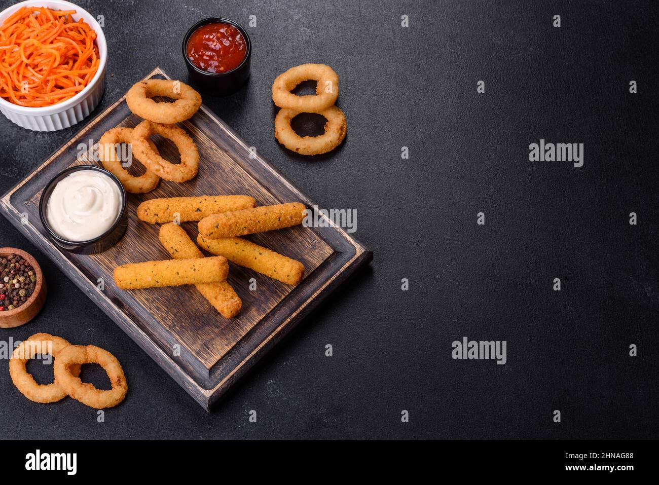 Fried crispy nutritious cheese or potato sticks. Snacks for beer Stock ...