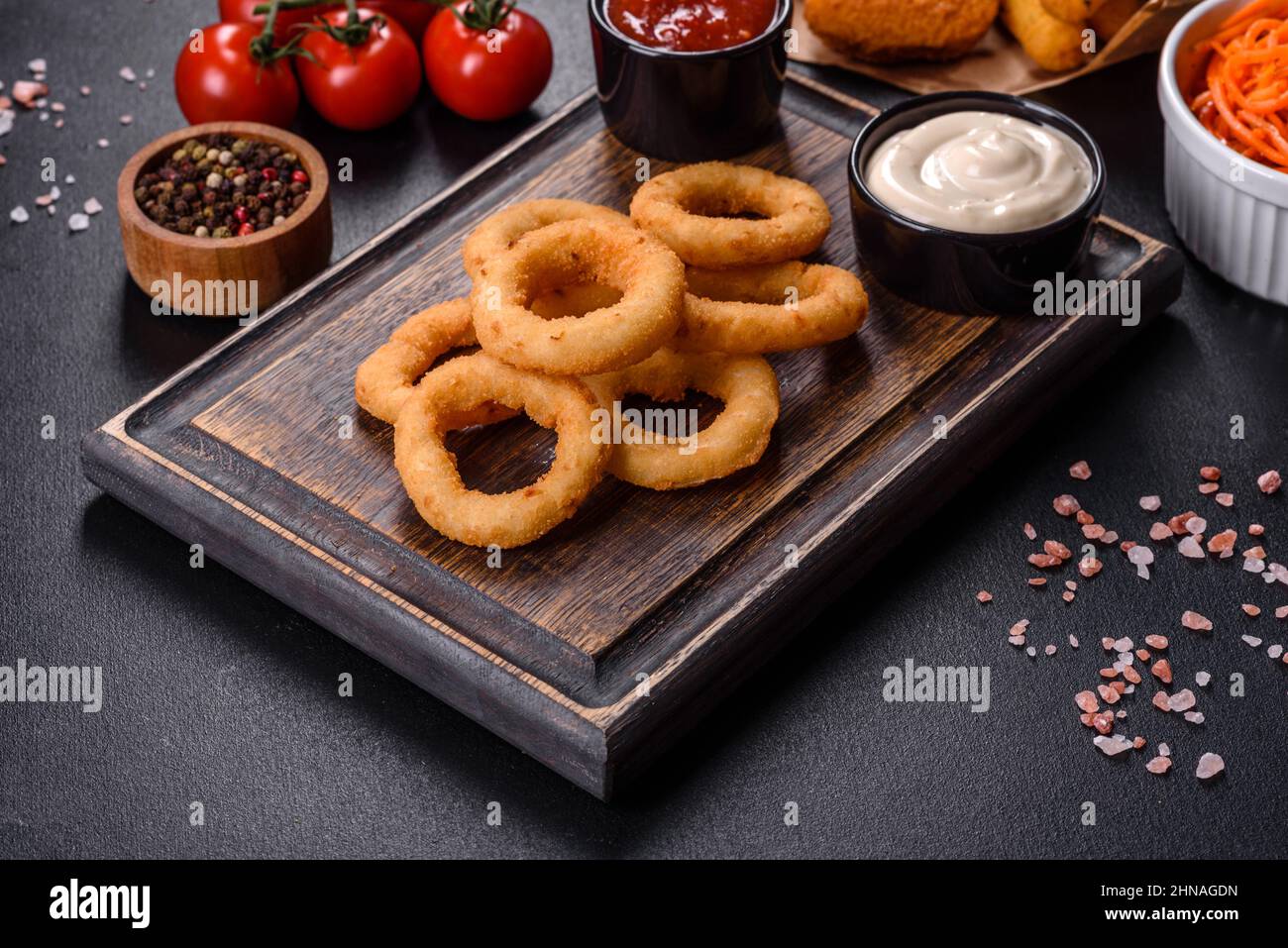 Delicious golden battered, breaded and deep fried crispy onion rings ...