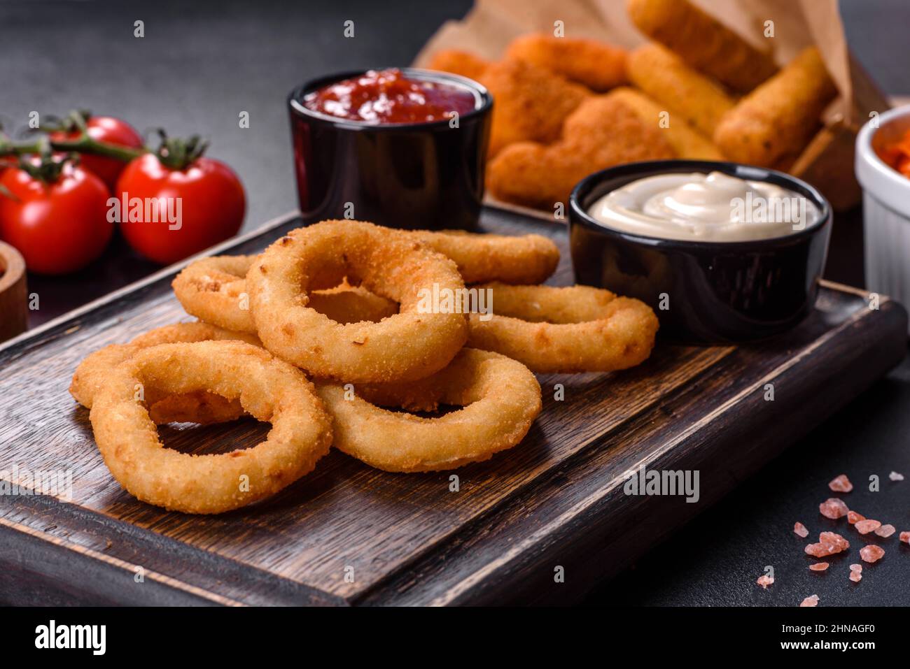 Delicious golden battered, breaded and deep fried crispy onion rings ...