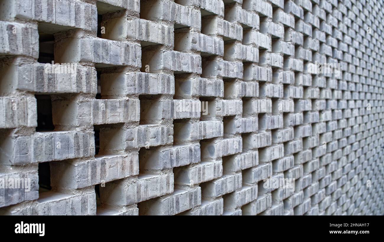 Air-permeable brickwork / brick façade with openings Stock Photo - Alamy