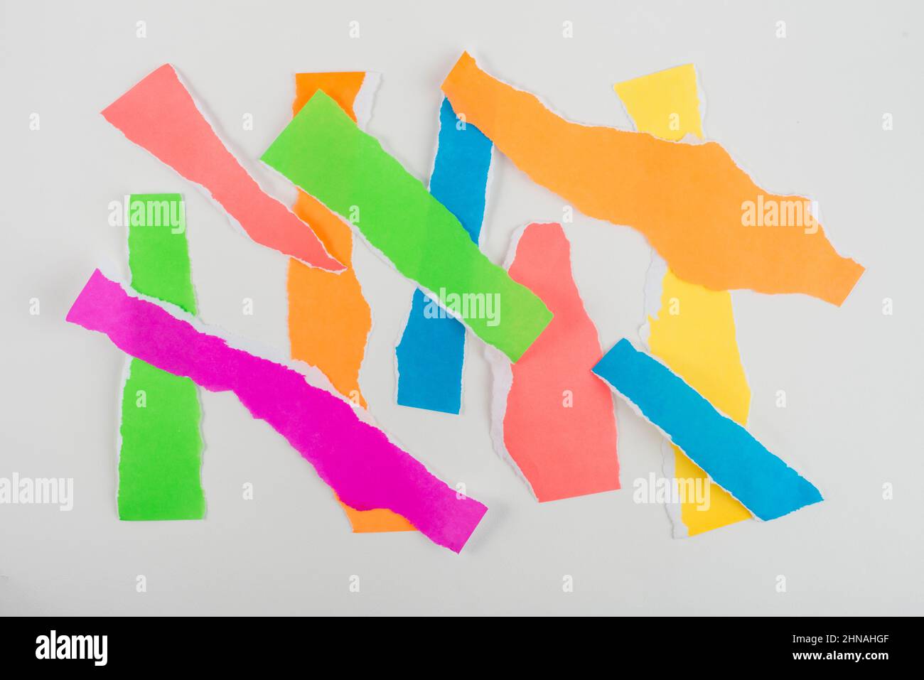 Neon colour torn paper strips isolated on white background Stock Photo ...