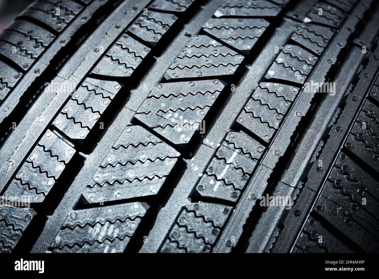 Tyre treads texture, dark abstract background Stock Photo - Alamy