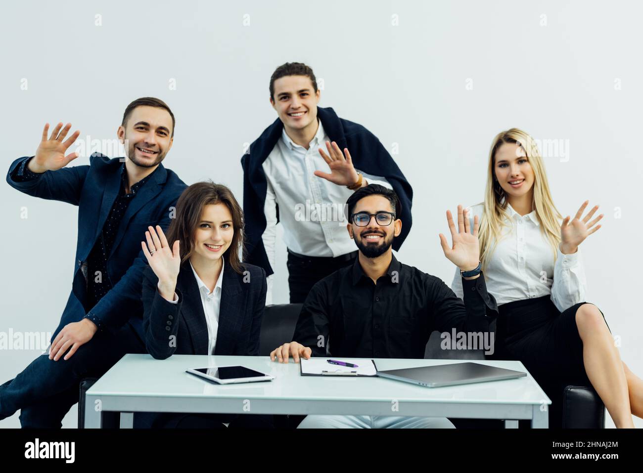 Group happy business people waving hi-res stock photography and images ...