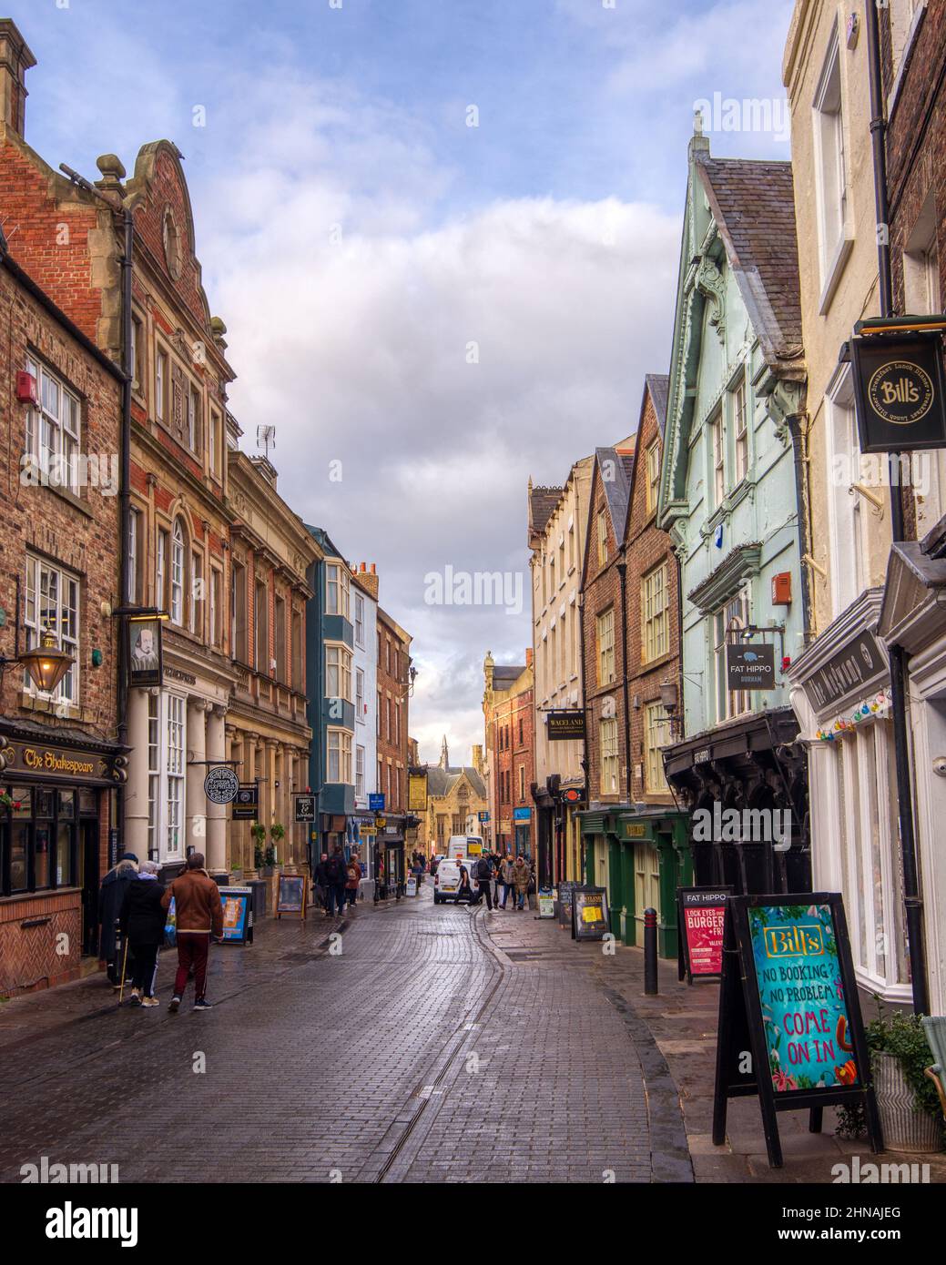A view of the shops and pubs along Saddler Street in Durham towards the ...