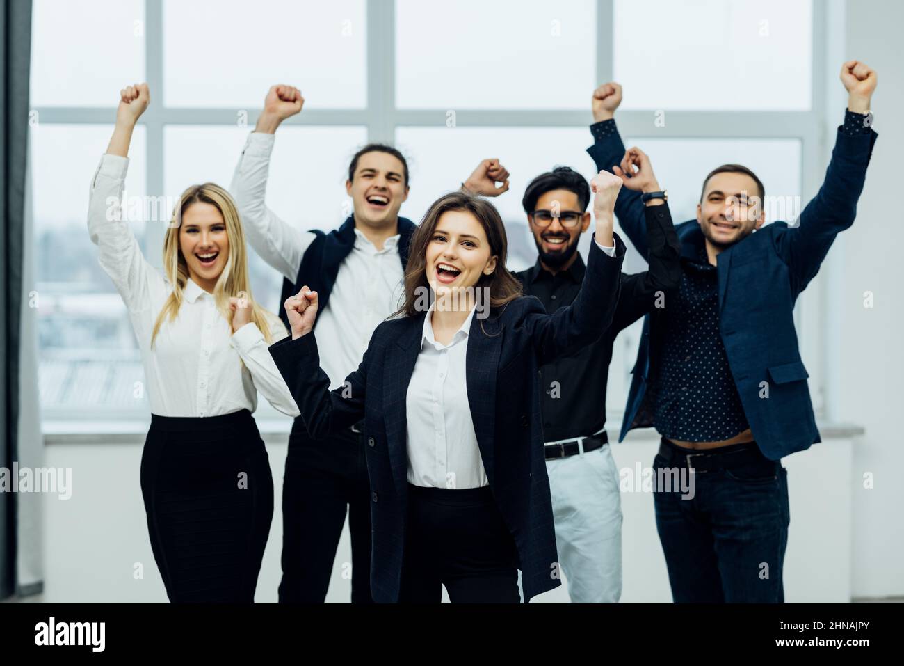 picture of happy business team celebrating victory in office Stock ...