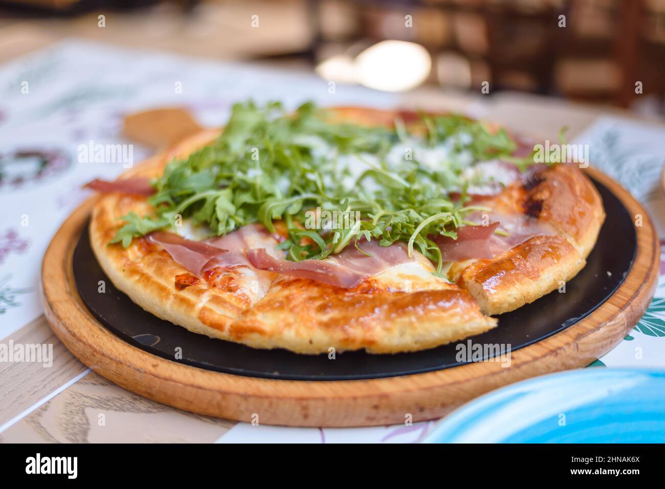 Whole small supreme delicious fast food pizza Stock Photo - Alamy