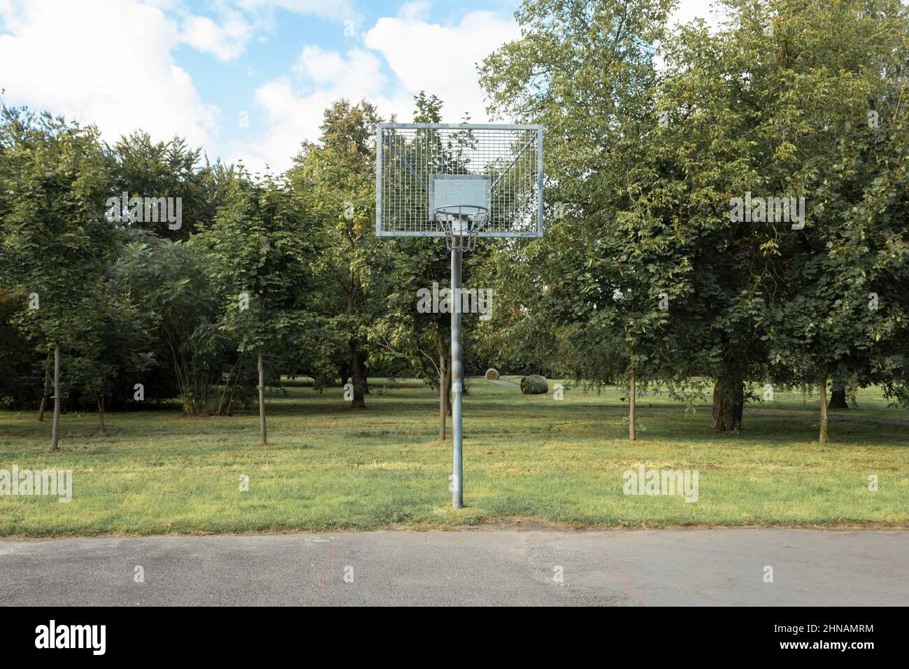 Basketball hoop on the playground in the city park. Basketball court in ...