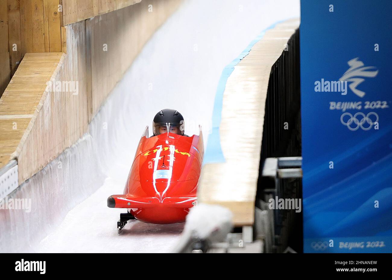 Beijing, China. 15th Feb, 2022. Li Chunjian/ Liu Wei of China compete ...