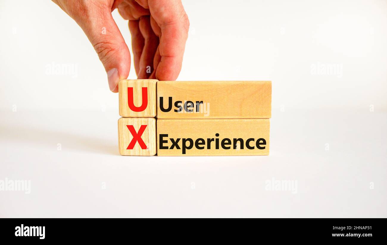 UX user experience symbol. Concept words UX user experience on wooden ...