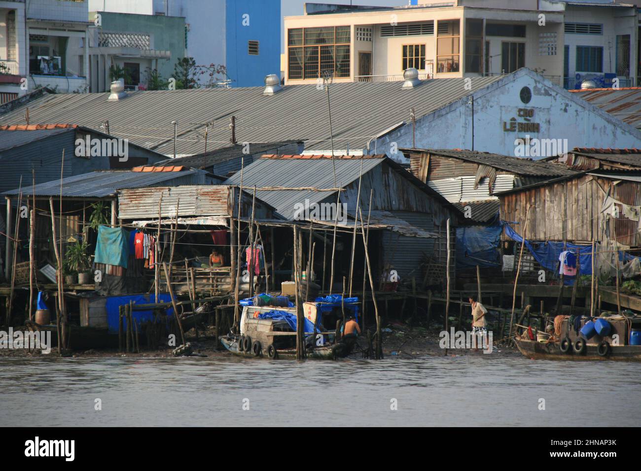 town and slum along a river in the mekong delta in south vietnam Stock ...