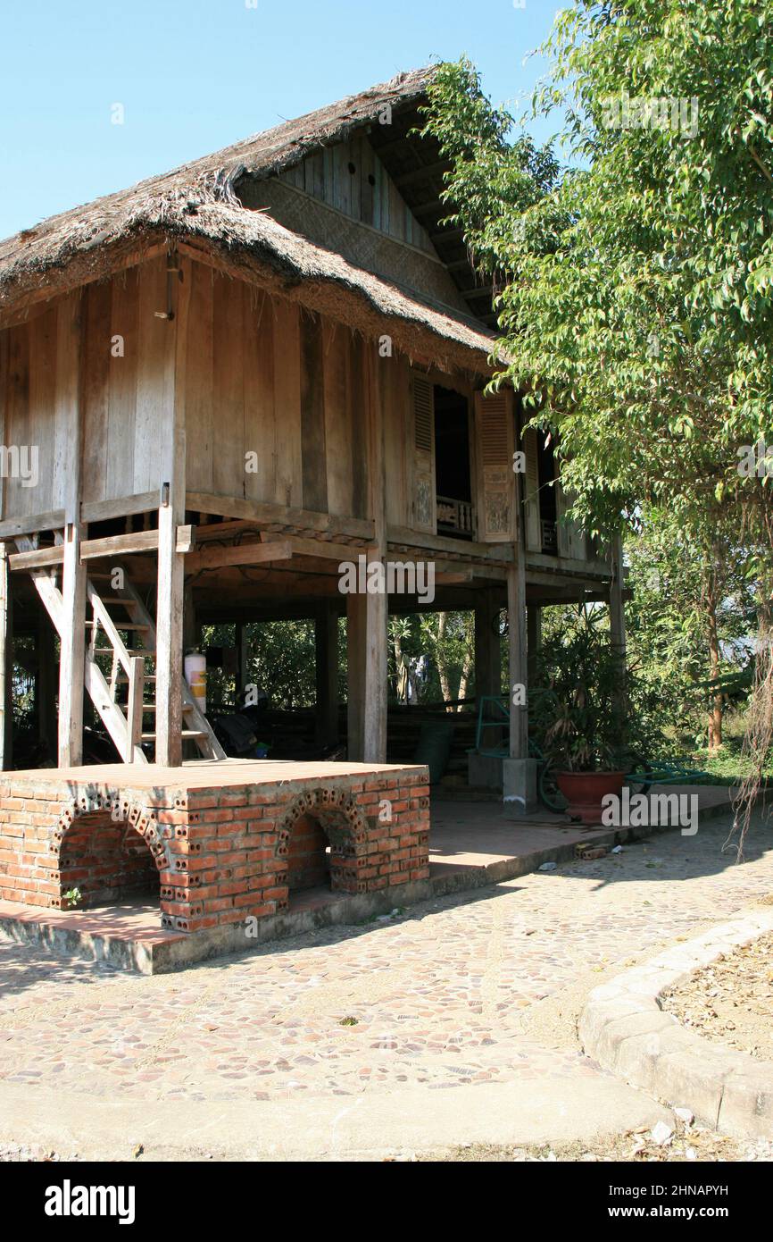 wooden building (barn ? farm ?) in a village in the countryside in ...