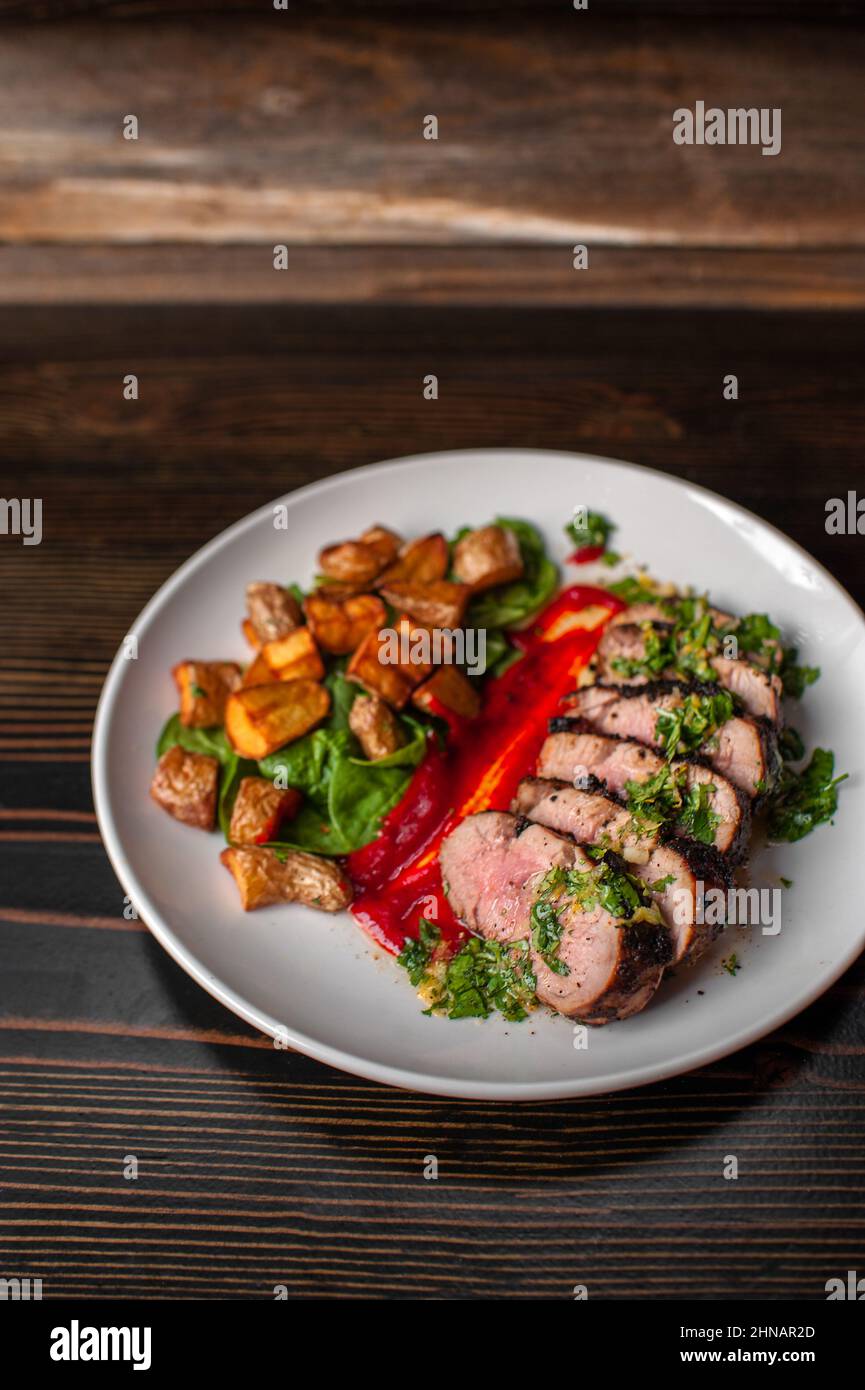 grilled pork tenderloin and vegetables Stock Photo - Alamy grilled pork tenderloin and vegetables Stock Photo - Alamy