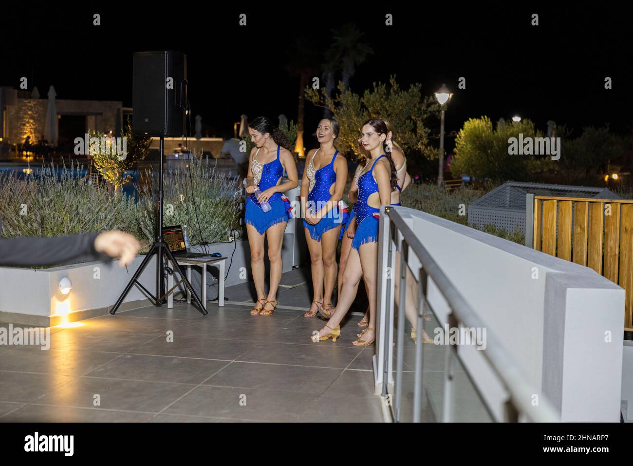 Showing beautiful dancers performing in front of tourists with ...