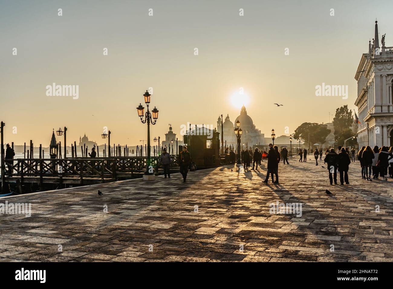 Venice,Italy-January 28,2022.People walking on embankment,enjoying ...