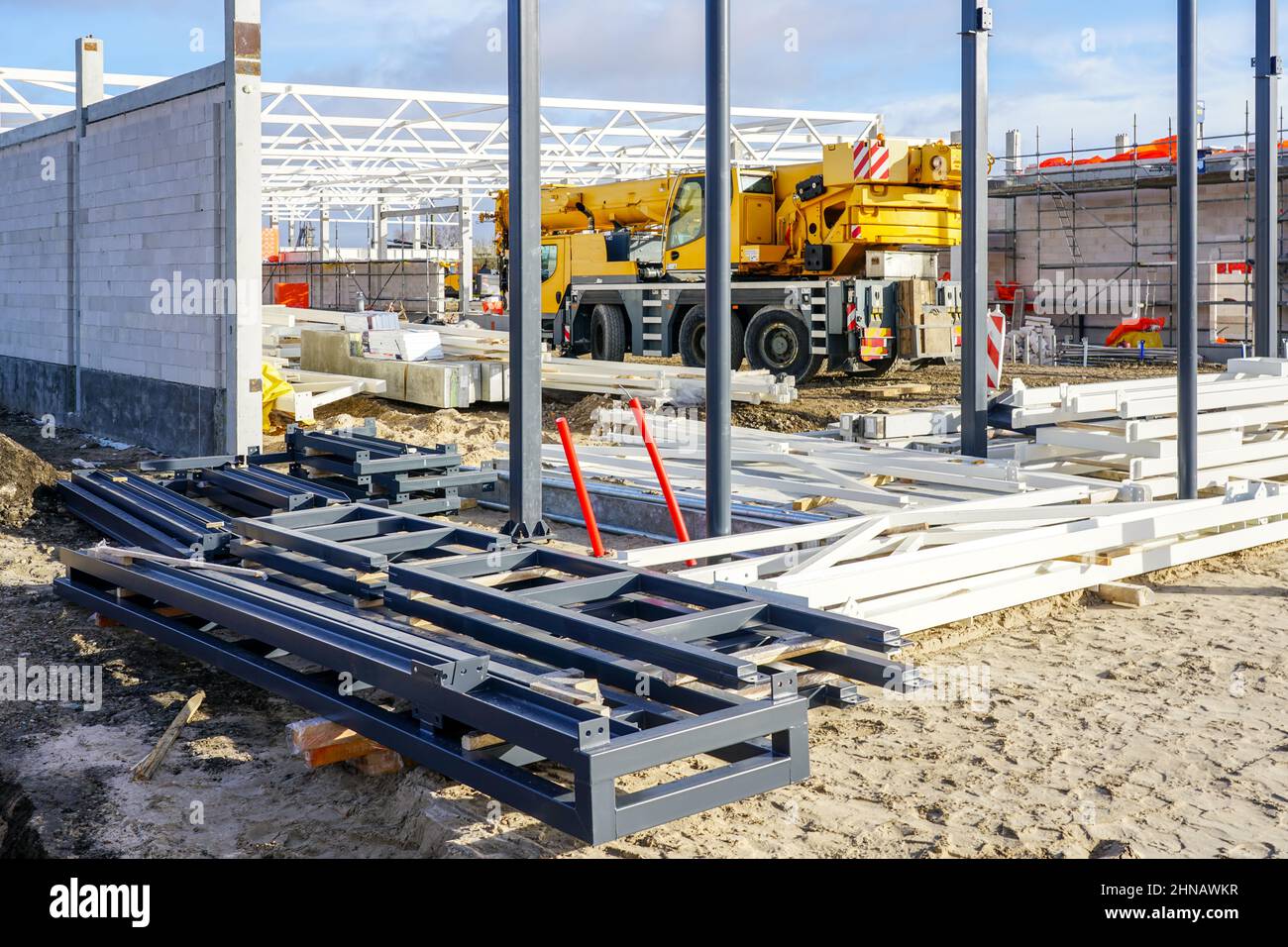 construction of a new modern store building using prefabricated metal ...