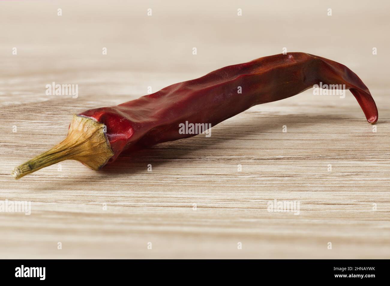 Chili Paprika, Dried Cayenne Pepper with Wooden Background Stock Photo ...
