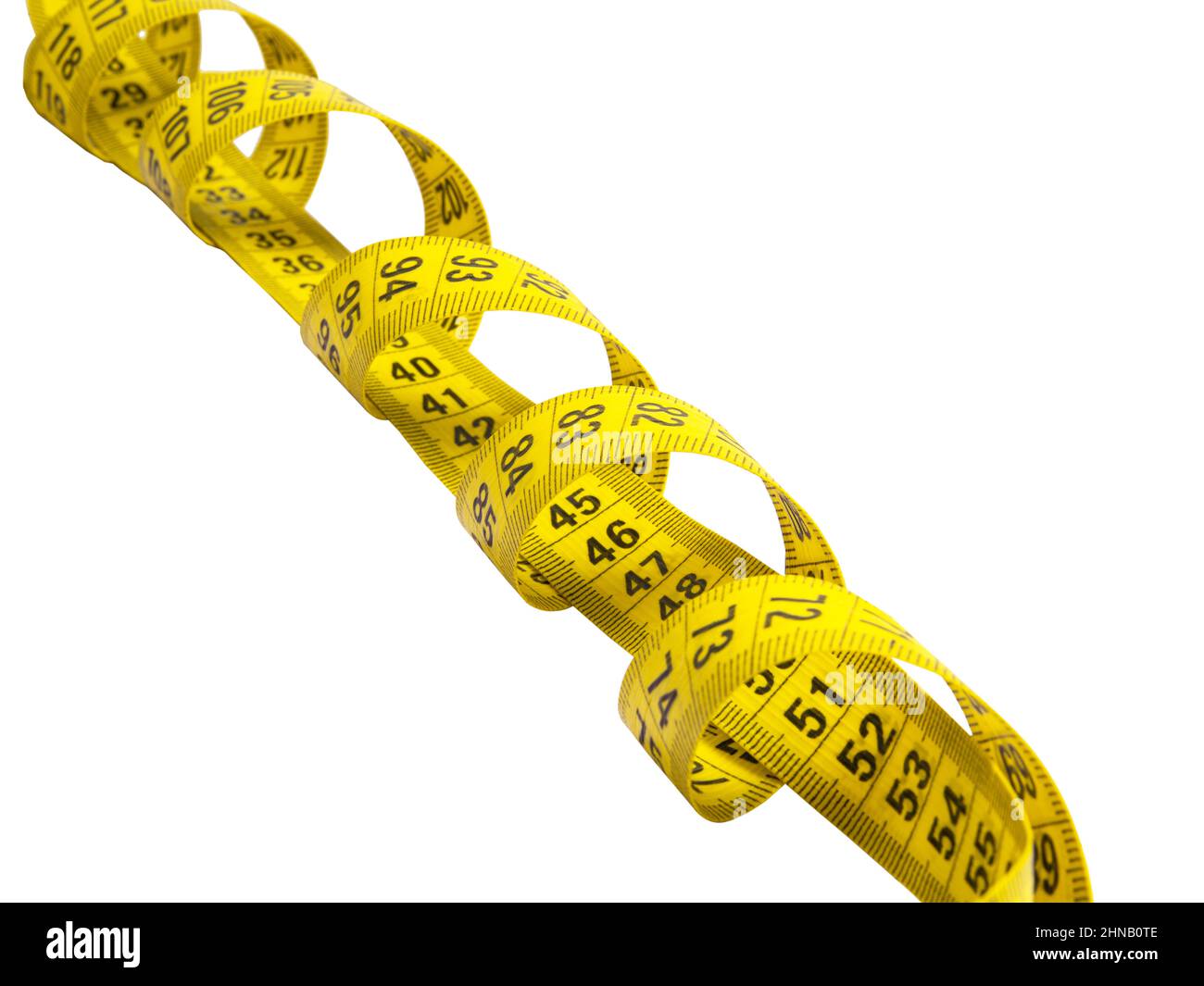 Yellow tape measure isolated on the white background Stock Photo - Alamy