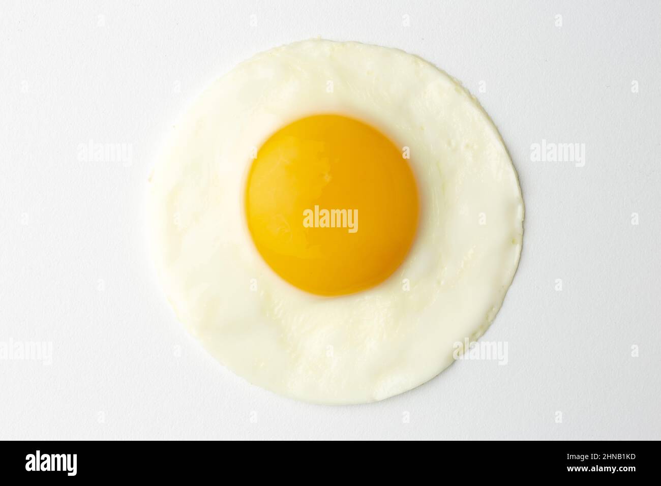 Fried egg isolated on a white background with free space for text Stock ...