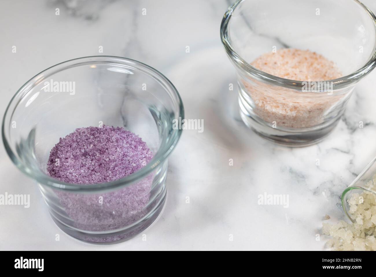 Marble counter top background with various red, pink Himalayan, purple ...