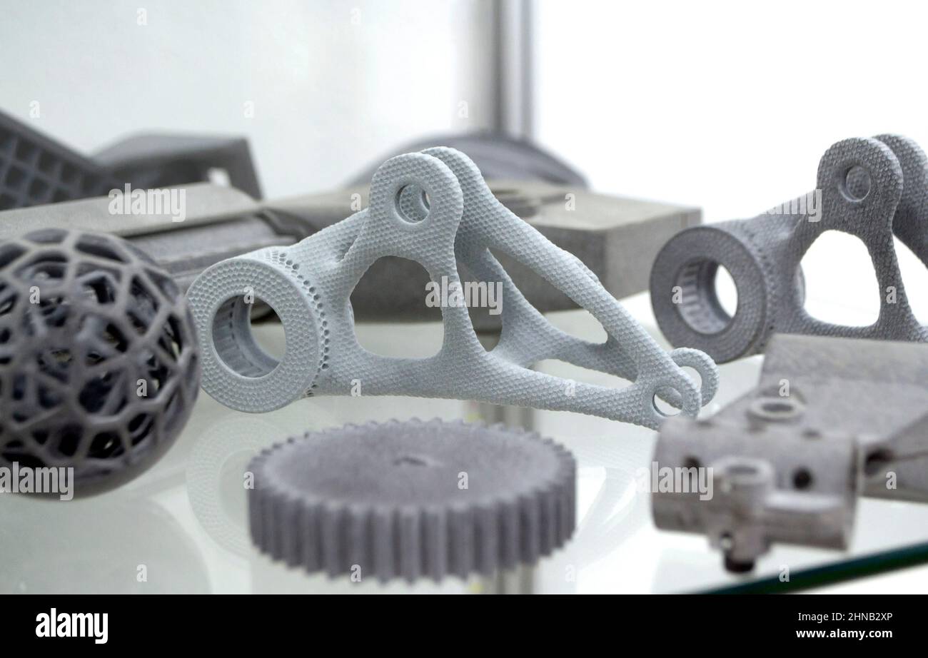 Different objects printed on industrial powder 3D printer. Multi Jet ...