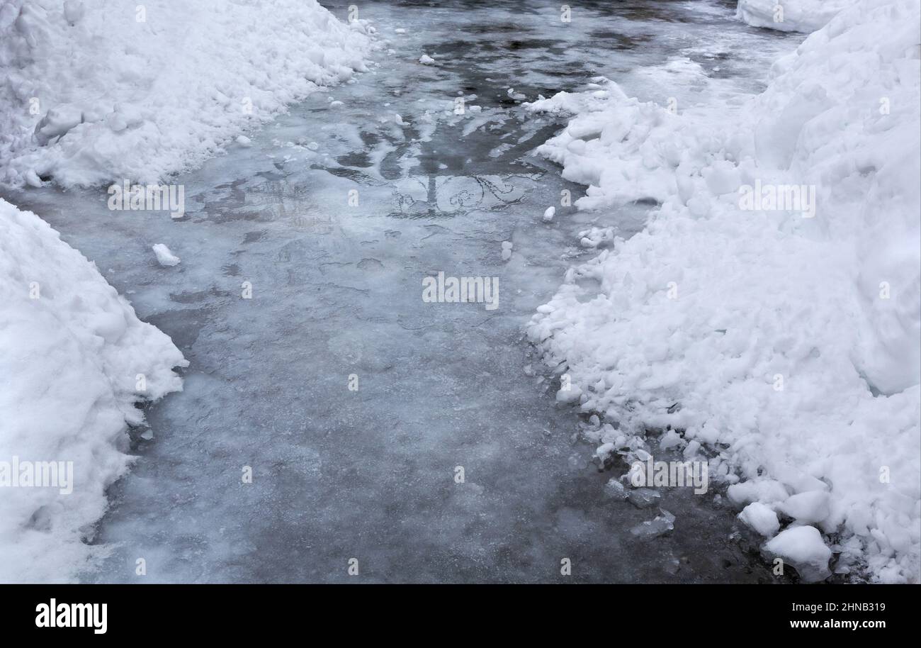 Springtime. Melting snow snowdrifts in spring. Spring thaw. Ice melts ...