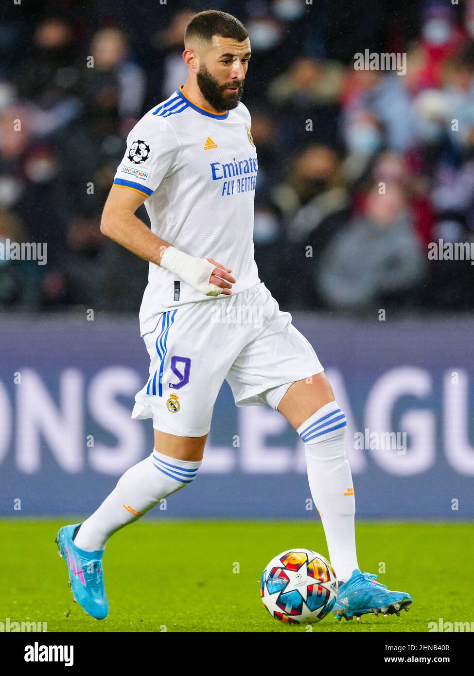 PARIS, FRANCE - FEBRUARY 15: Karim Benzema of Real Madrid runs with the ...