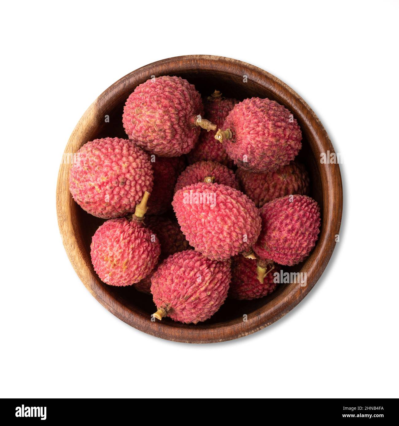 Lychees in a bowl isolated over white background Stock Photo - Alamy
