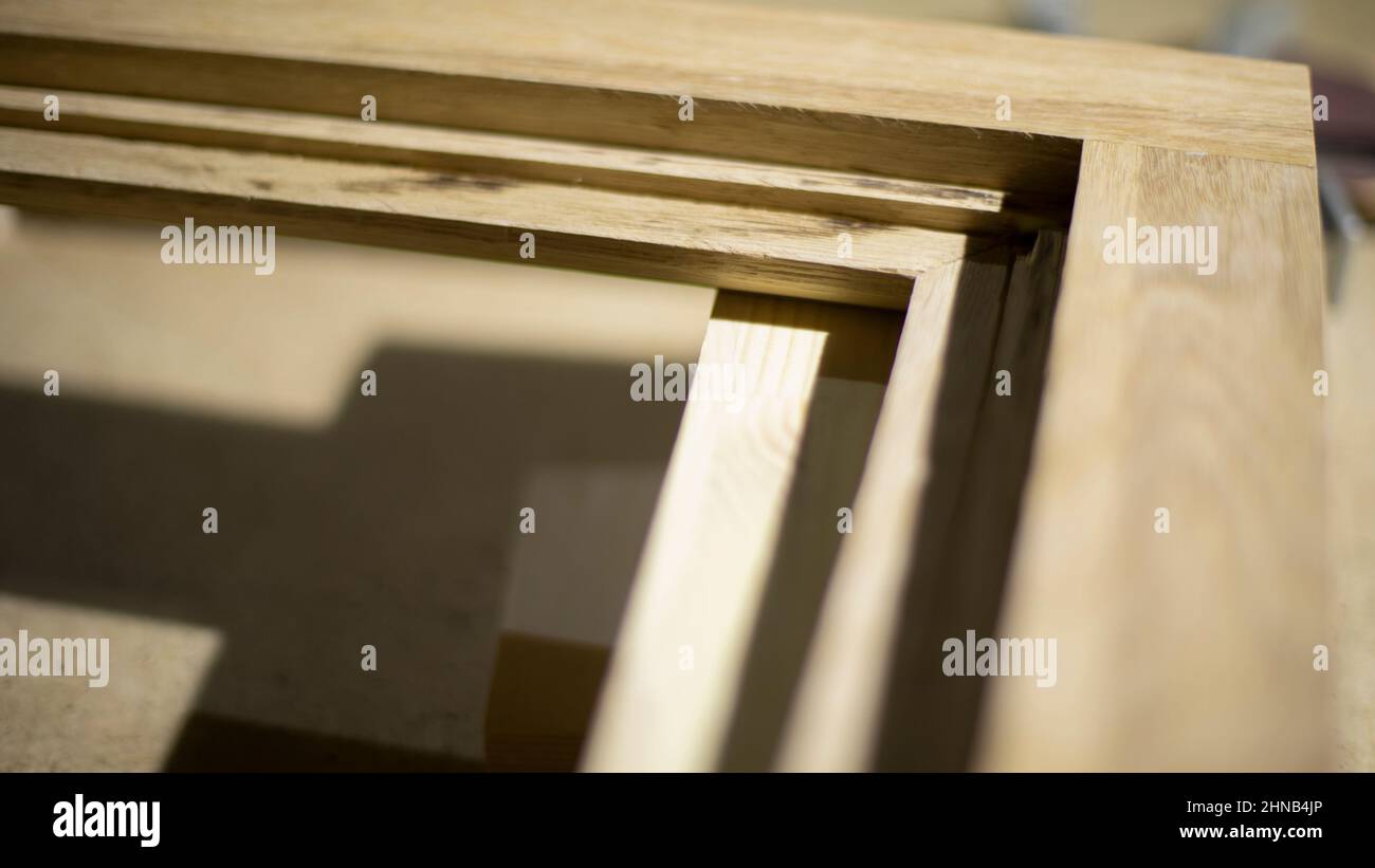 Angle of frame. Raw wood. Processing of boards to create interior ...