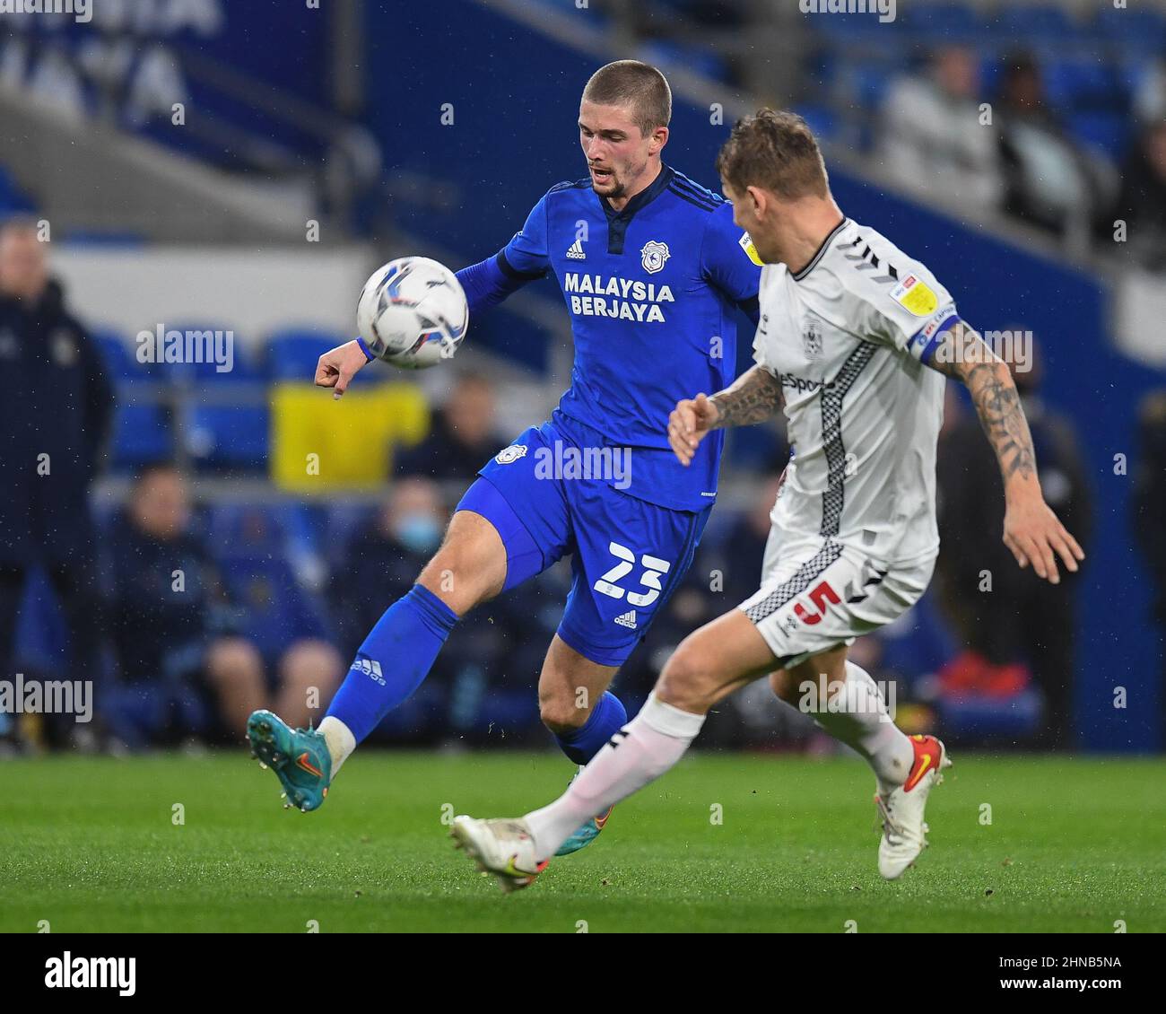 Max Watters #23 of Cardiff City takes on Kyle McFadzean #5 of Coventry ...