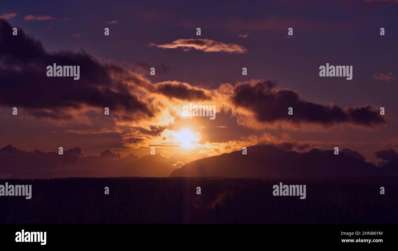 Beautiful sunset with sky clearing after a storm in Southeast Alaska ...