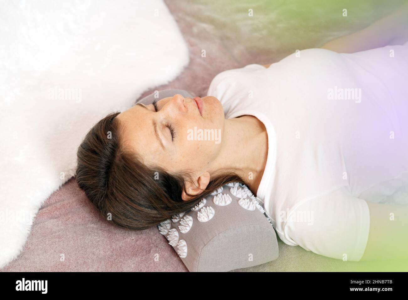Closeup shot of a beautiful Caucasian woman sleeping and relaxing her ...