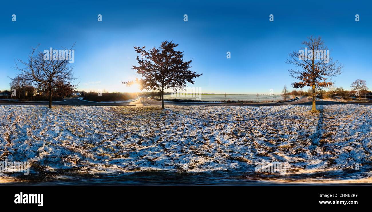 Spherical panorama from inside a traffic circle at the edge of ...