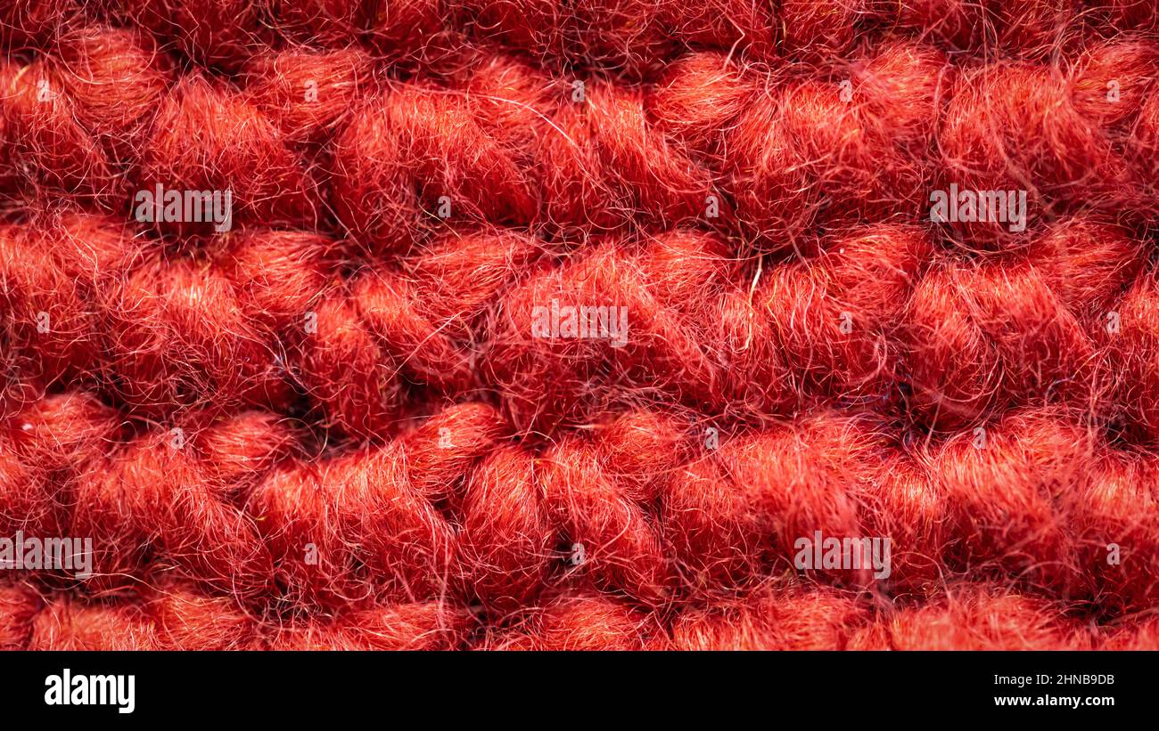 Closeup of a wool structure in red color Stock Photo - Alamy