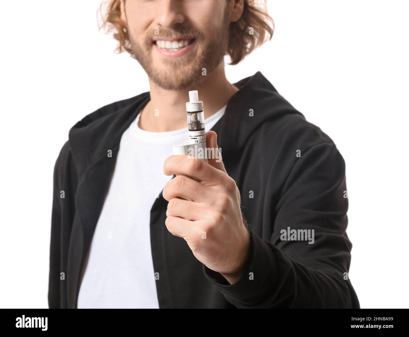 Handsome young man with vape mod on white background Stock Photo - Alamy