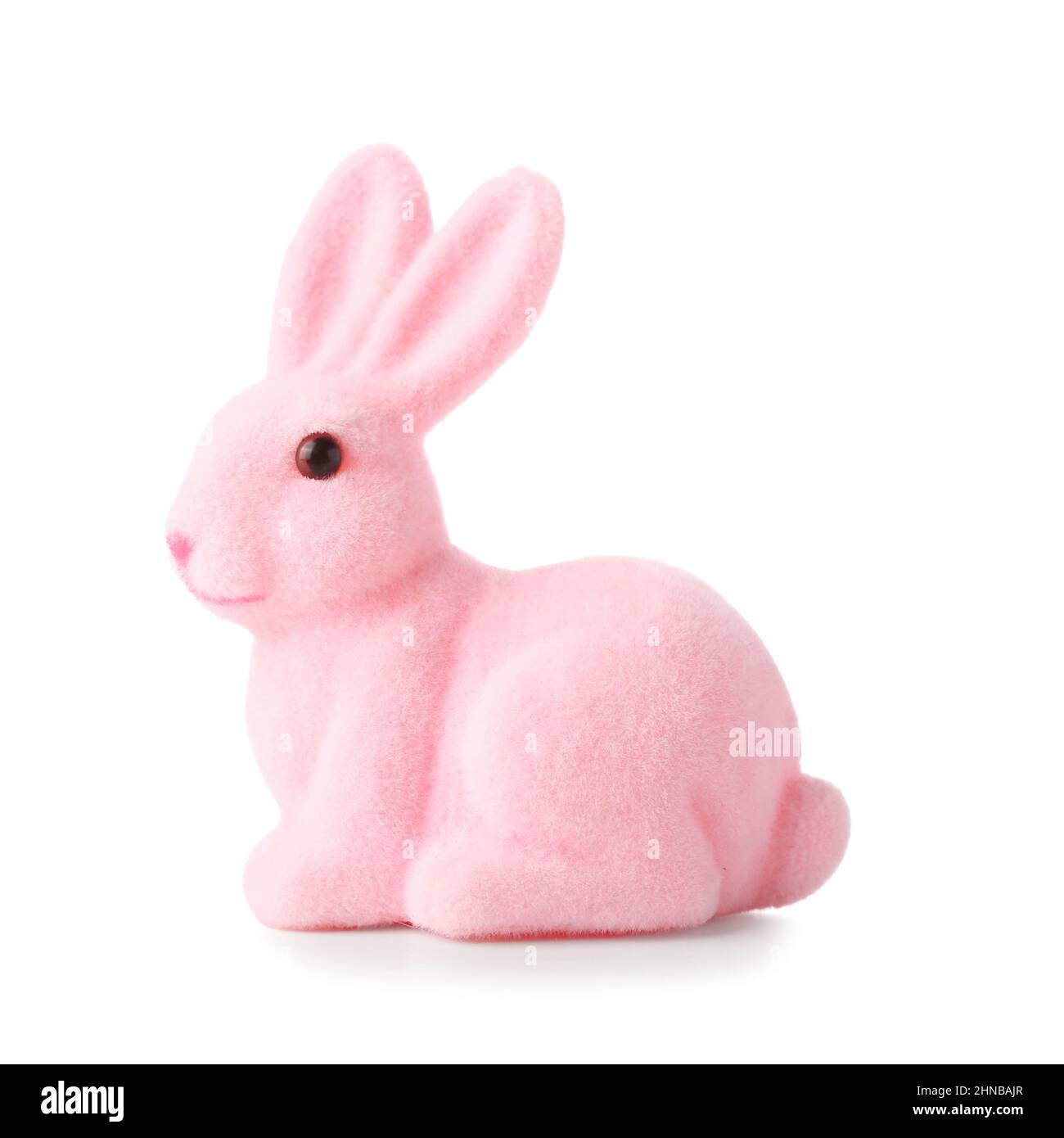 Pink Easter bunny on white background Stock Photo - Alamy