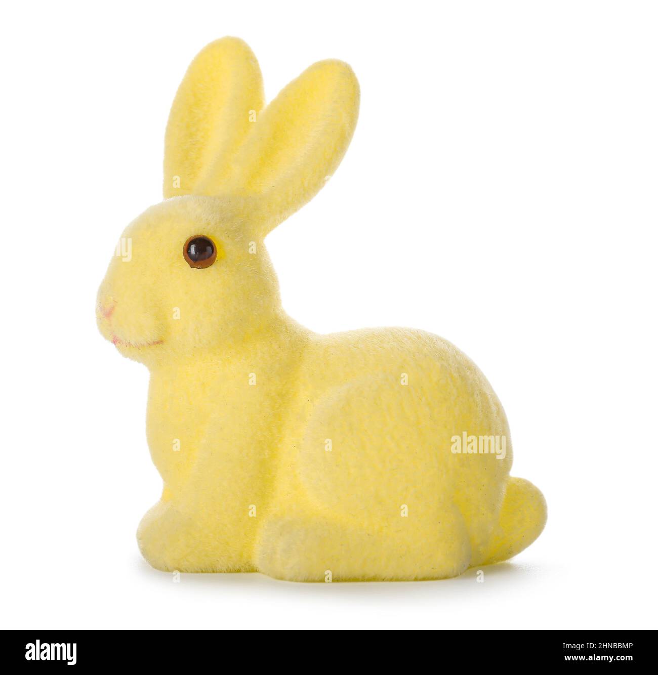 Cute yellow Easter bunny on white background Stock Photo - Alamy
