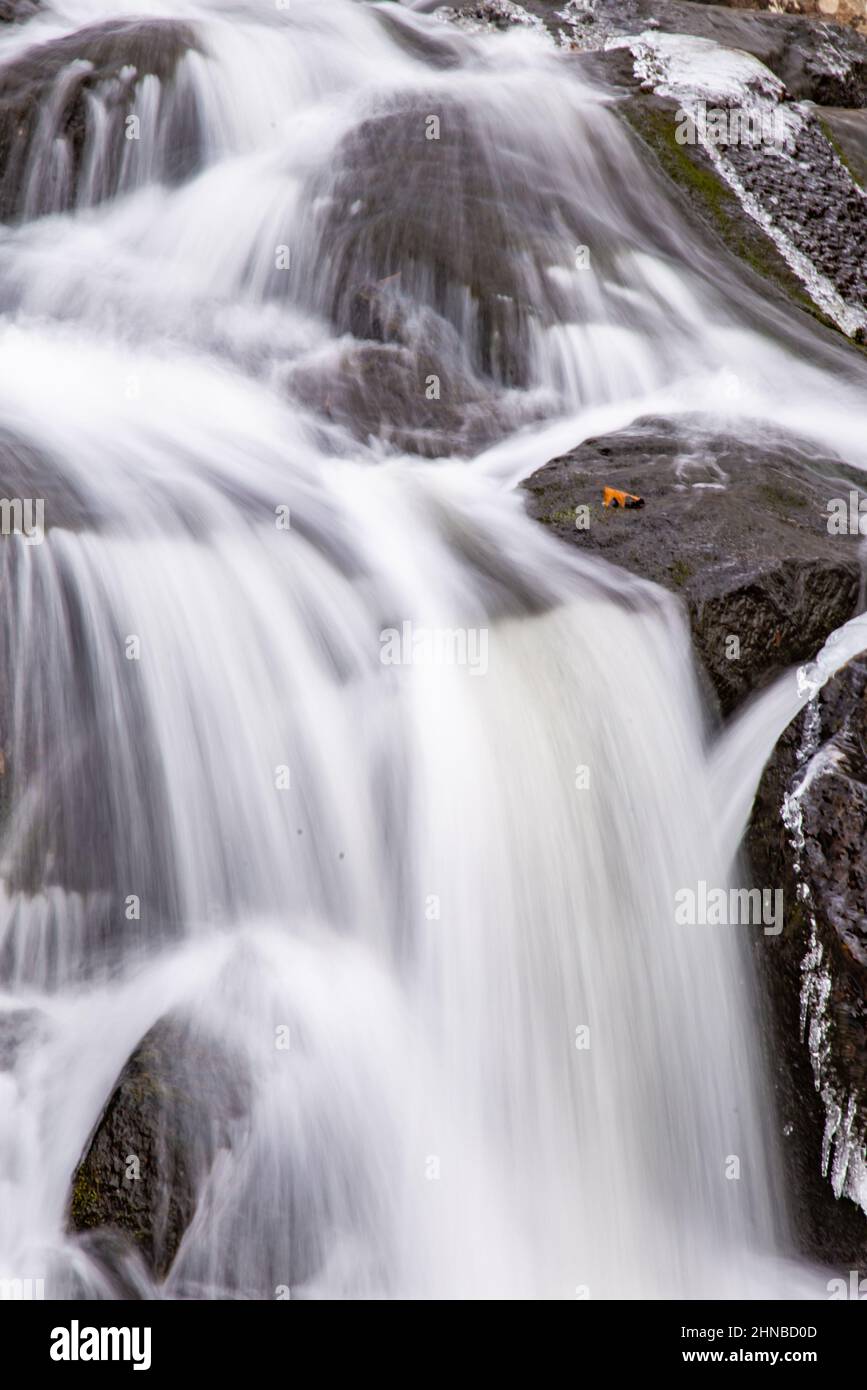 Waterfall blurred by slow shutter speed Stock Photo - Alamy