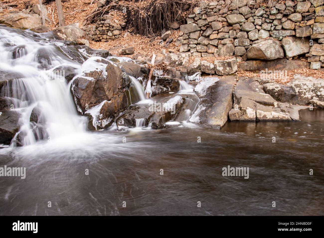 Waterfall blurred by slow shutter speed Stock Photo - Alamy