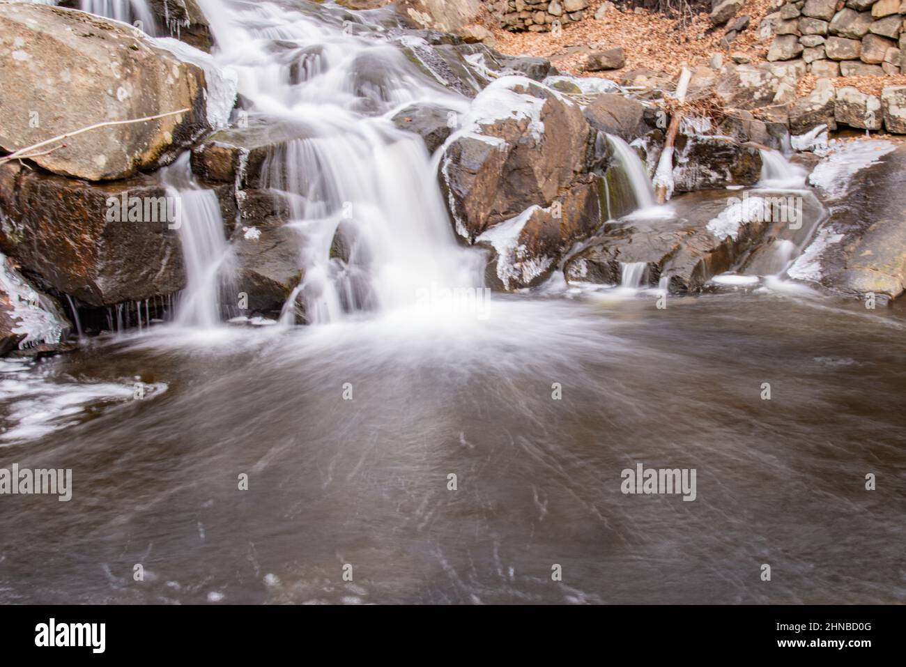 Waterfall blurred by slow shutter speed Stock Photo - Alamy