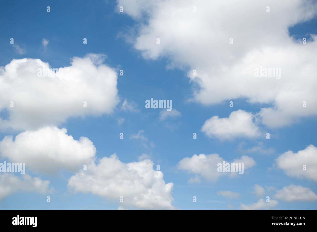 Beautiful blue sky with fluffy white clouds Stock Photo - Alamy