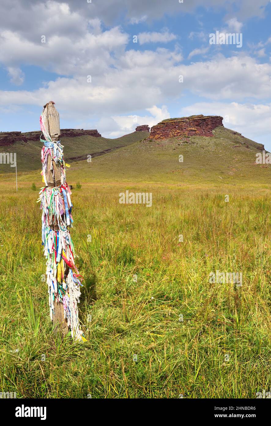 A ritual pillar with colored ribbons on the background of the Chest ...