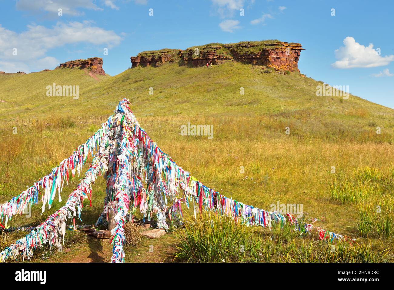 A ritual pillar with colored ribbons on the background of the Chest ...