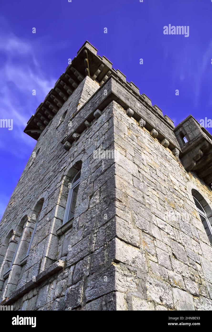 The top of the observation stone tower under the blue sky. Sochi ...