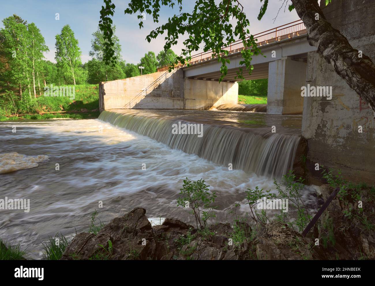 Waterfall on the river Suyenga. An artificial waterfall on the site of ...