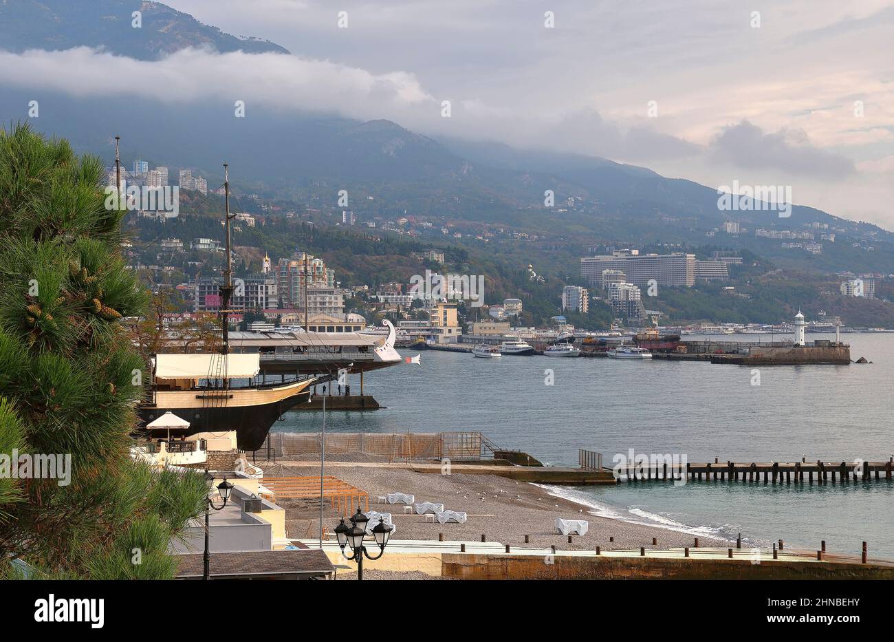 Coast of Yalta in the Crimea. Ships, lighthouse, pier, piers, beaches ...