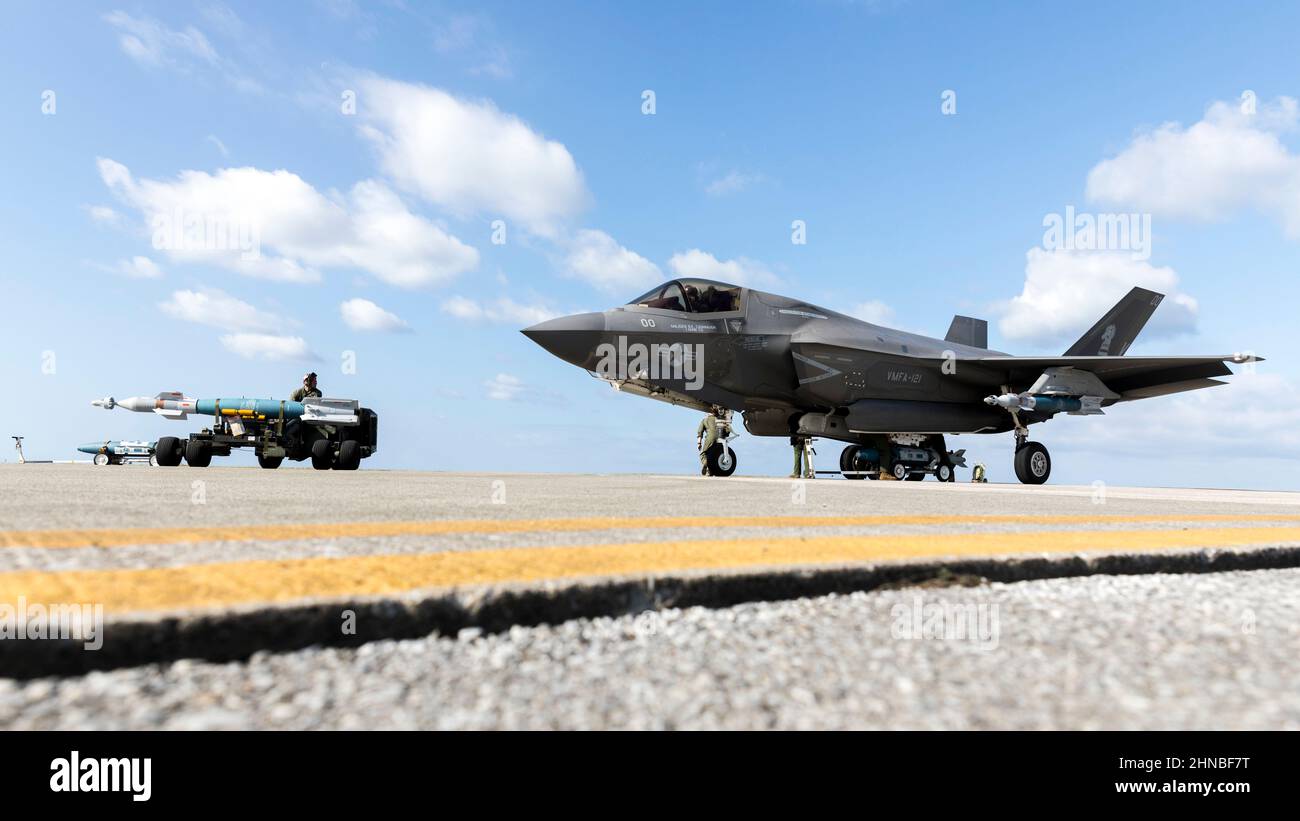 U.S. Marines with Marine Fighter Attack Squadron (VMFA) 121 load ...