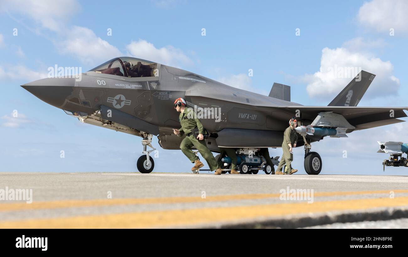 U.S. Marines with Marine Fighter Attack Squadron (VMFA) 121 load ...